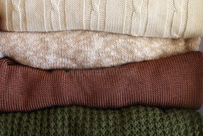 Folded Sweaters stock photo. Image of clothing, arranged - 214120992
