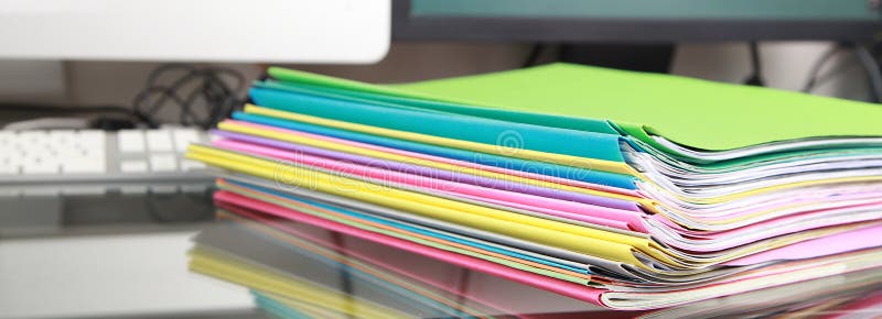 Stack of Folders Containing Work Documents in Different Colors Stock ...