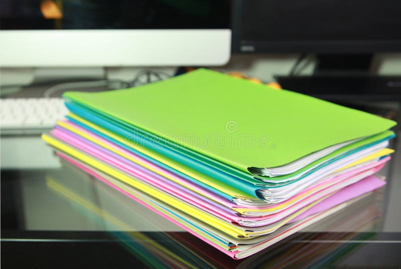 Stack of Folders Containing Work Documents in Different Colors Stock ...