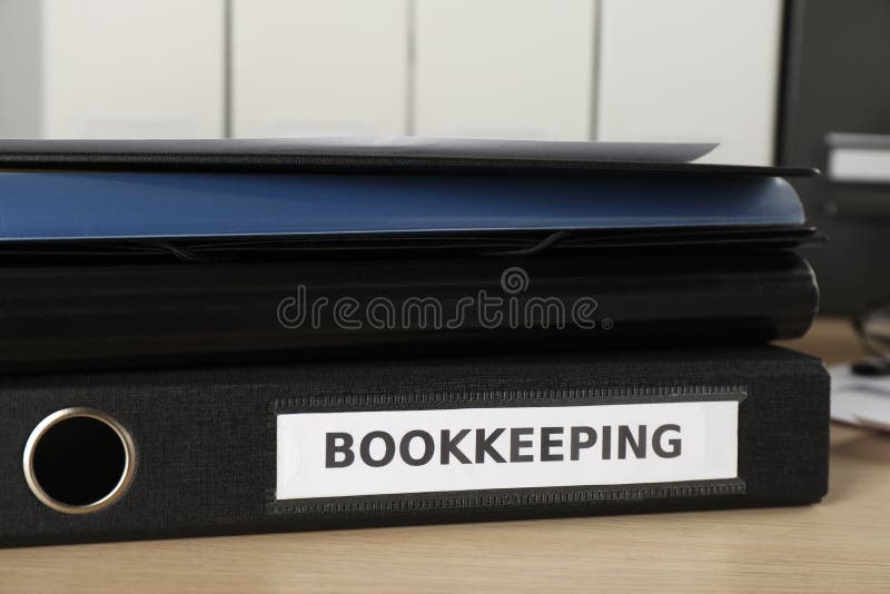 Stack of Folders on Desk in Office, Closeup. Bookkeeper`s Workplace ...