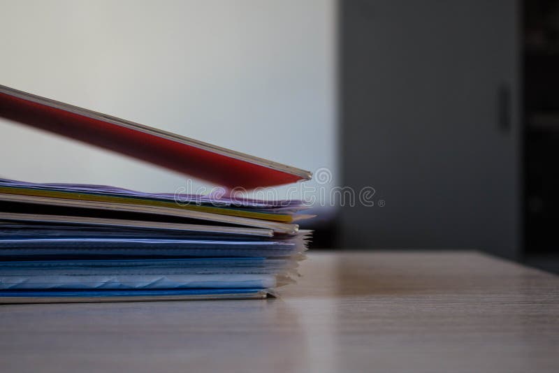 A Stack of Folders with Documents on the Table Stock Image - Image of ...