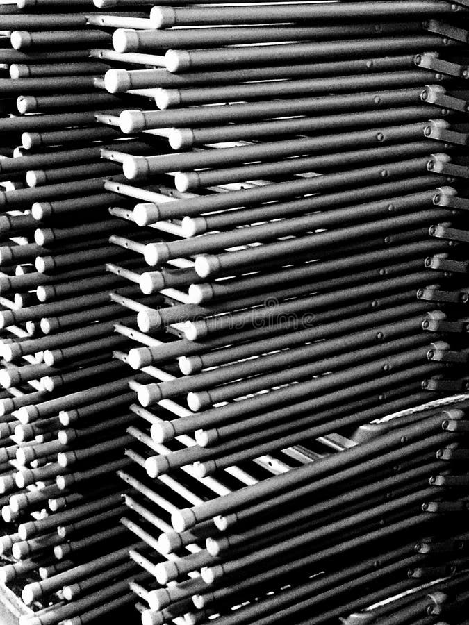 Stack of Folding Chairs stock photo. Image of event - 156004664