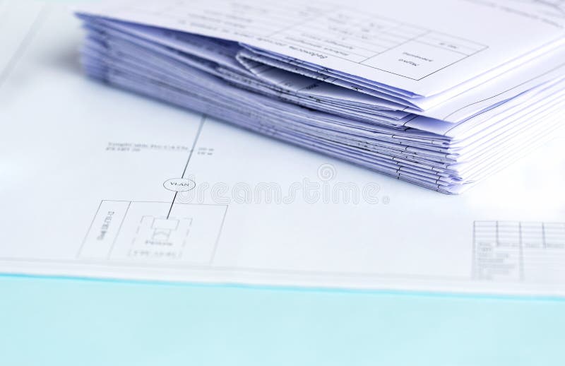 Stack Folding Drawings on a Blue Background. Top View. Flat Lay. Copy ...