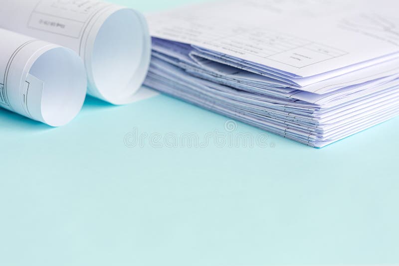 Stack Folding Drawings on a Blue Background. Top View. Flat Lay. Copy ...