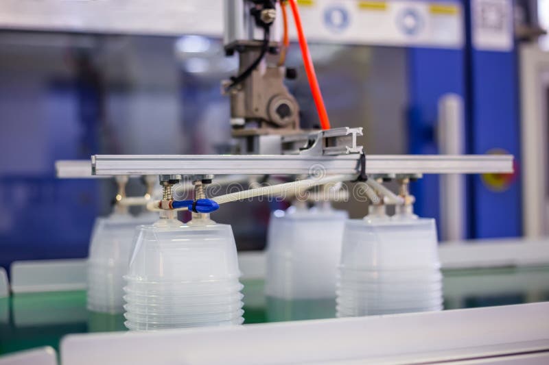 Stack of Food Containers on Conveyor Belt of Plastic Injection Molding ...