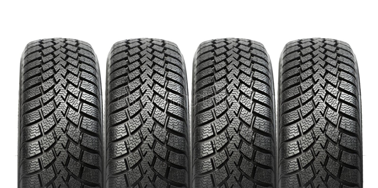 Stack of Four Car Wheel Winter Tires Isolated Stock Image - Image of ...