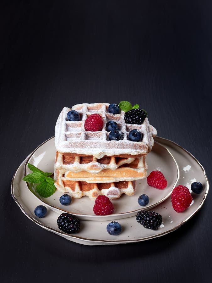 Plate of Home Made Belgian Waffles with Ice Dusting, Fresh Berries and ...