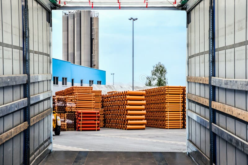 Stack of Freight Containers at the Docks with Truck Stock Photo - Image ...