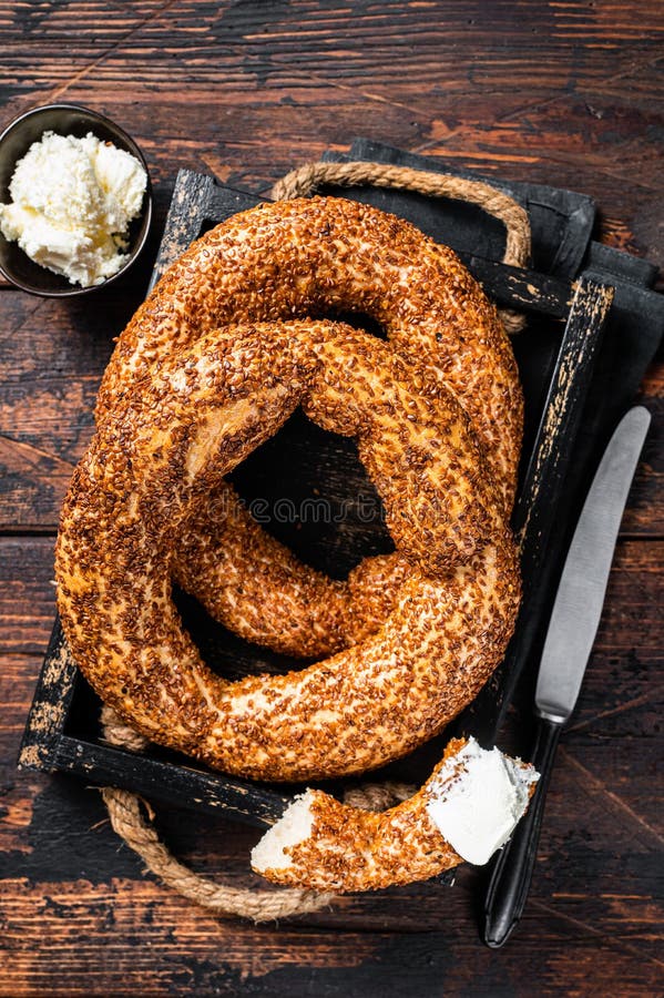 Stack of Fresh Baked Turkish Simit Bagel with Kaymak. Wooden Background ...