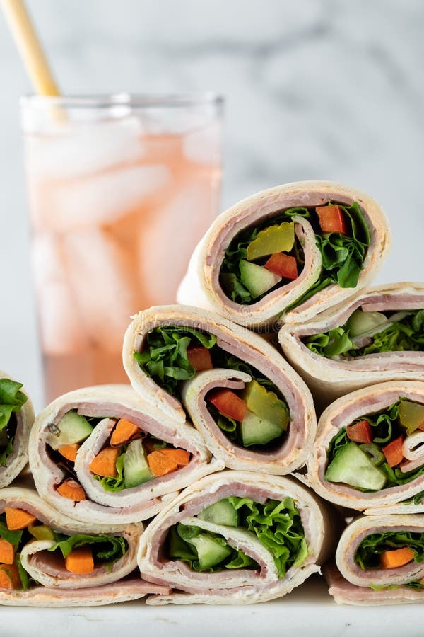 A Stack of Fresh Wraps with a Glass of Sparkling Juice in Behind. Stock ...