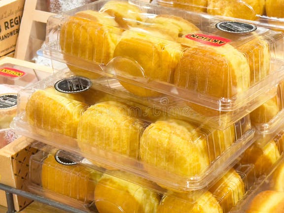 Stack of Freshly Baked Bread Rolls in Plastic Packaging at Bakery ...
