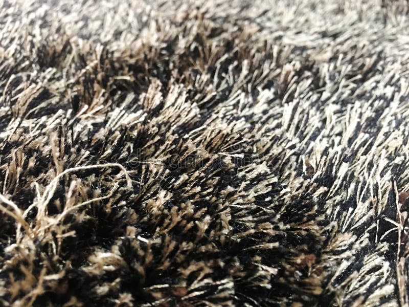 A Stack of Fringed Textiles. Plaid, Carpet for Home Comfort Stock Image ...