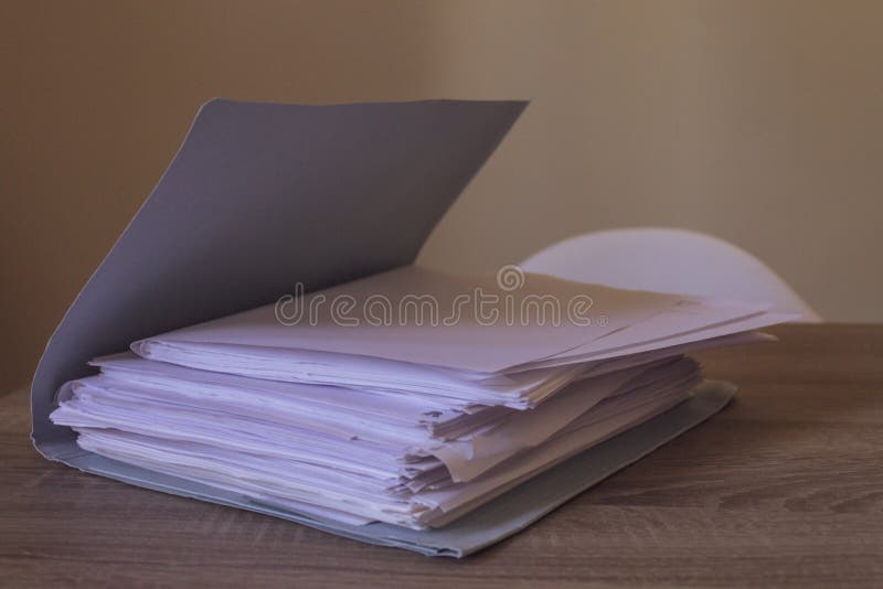 Stack of Full File Folder on a Wooden Desk. Stock Photo - Image of ...