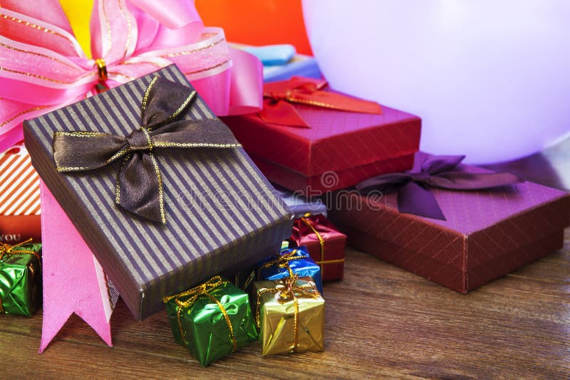 Stack of Gift Box Lying on Top Wood Table Stock Photo - Image of bulb ...