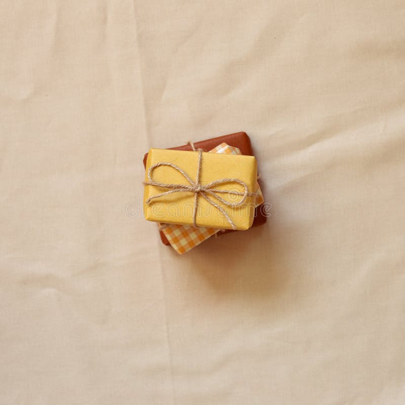Stack of Gift Boxes on Natural Cotton Fabric Background Stock Photo ...
