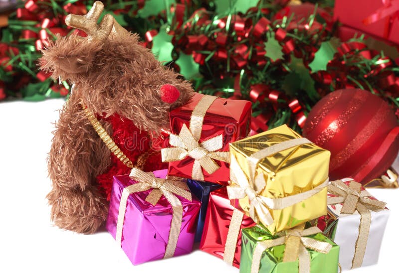 Stack of Gift Boxes, Tinsel and Moose Stock Photo - Image of package ...
