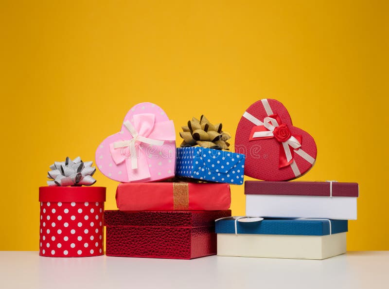 Stack Gift Boxes Wrapped Colorful Paper Yellow Background Happy ...