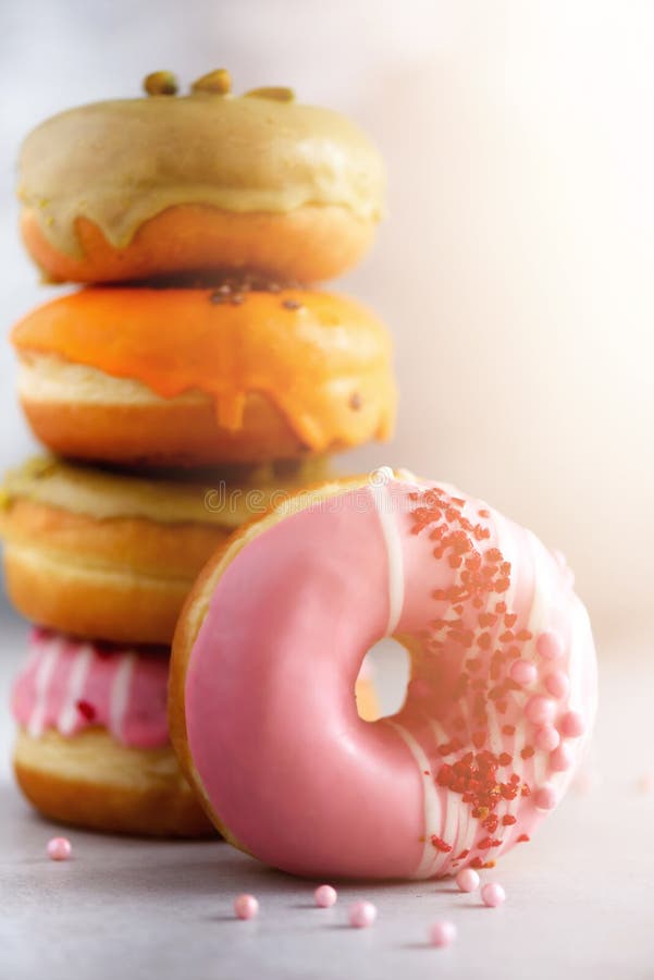 Stack of Glazed Donuts stock photo. Image of delicious - 12360148
