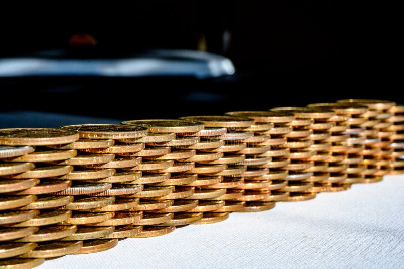 Stack of Gold and Silver Dollar Coins Forming a Border Wall Stock Image ...