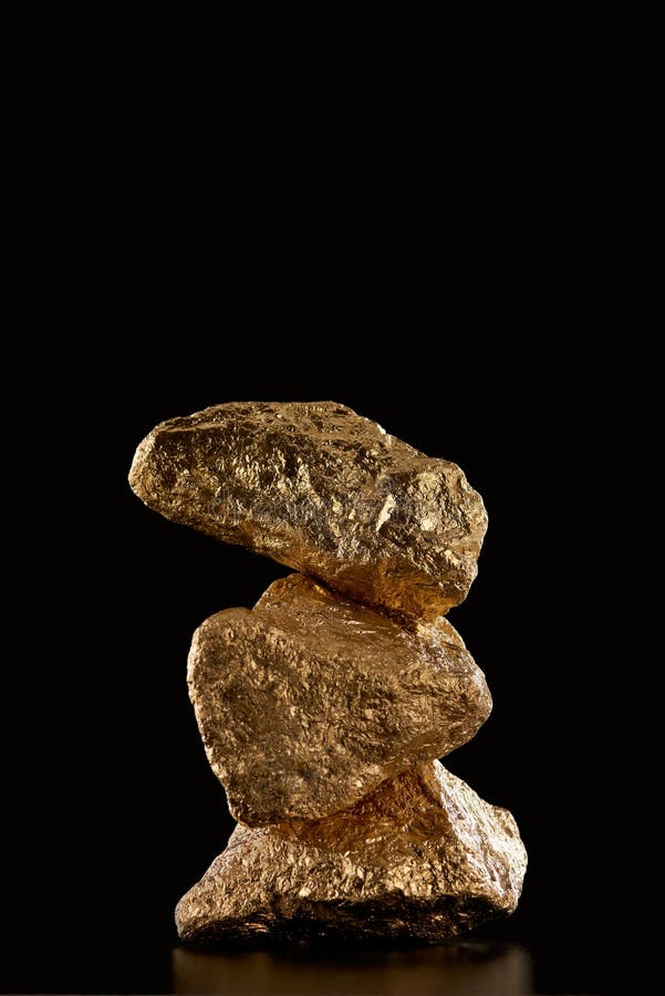 Stack of Gold Textured Stones Isolated on Black with Copy Space. Stock ...