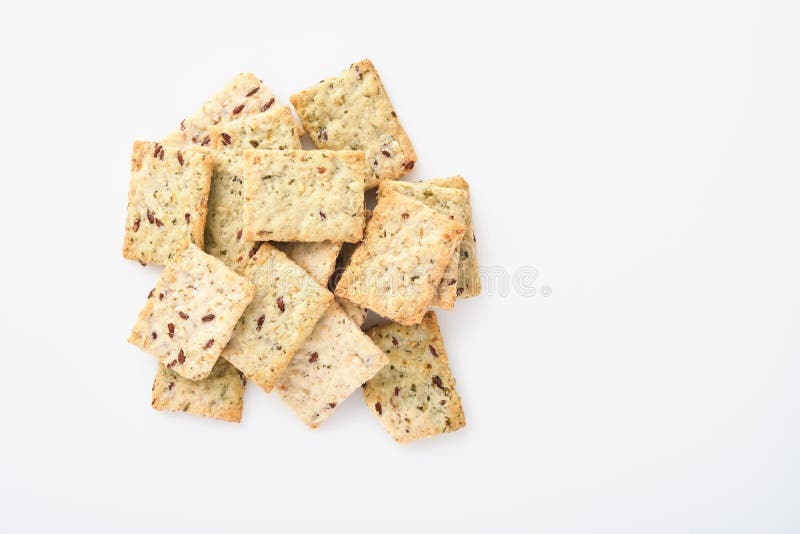 Stack of Grain Salty Crackers with Bran and Flax Seeds on White ...