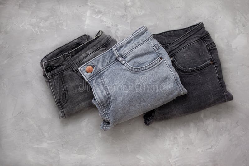 Stack of gray jeans stock photo. Image of sale, grunge - 84121042
