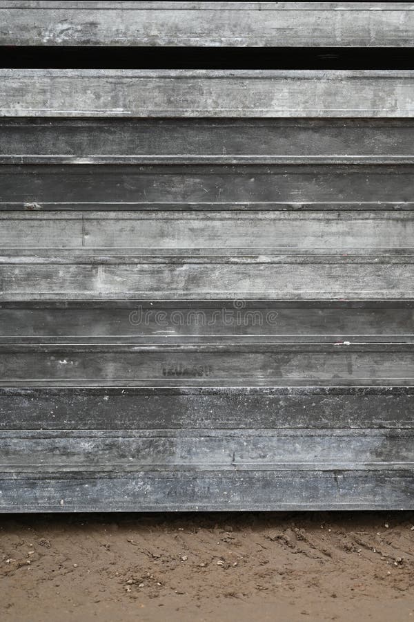 A Stack of Metal Racks at a Construction Site Stock Photo - Image of ...