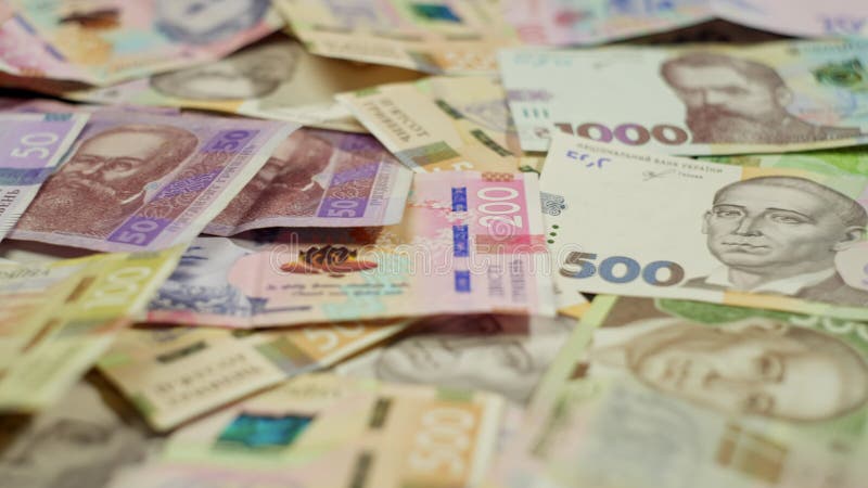 A Stack of Cash, in Green Banknotes, Sits on a Table Stock Footage ...