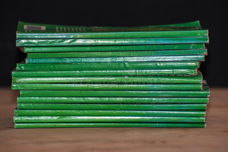 A Stack of Green Books Lies on the Table. Library, Education. Empty ...