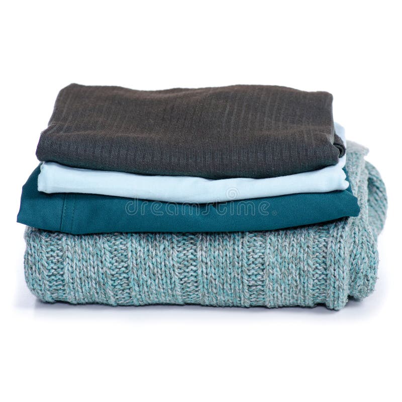 Stack green clothes stock photo. Image of cotton, lifestyle - 141889464