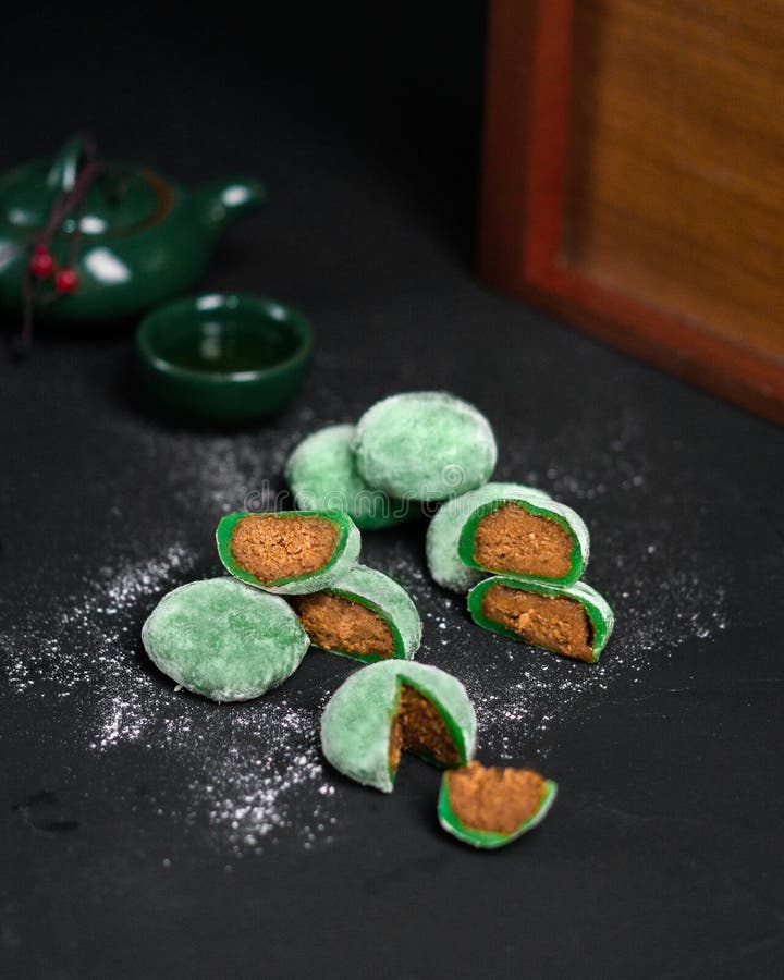 A stack of green mochi stock photo. Image of peanuts - 327878756