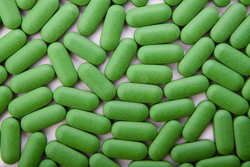 Stack of green pills stock image. Image of pharma, isolated - 41909445