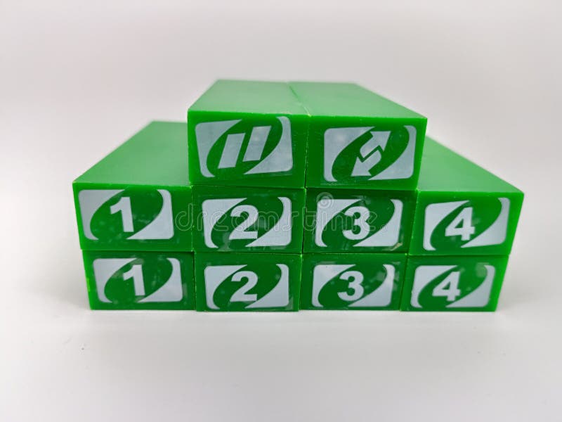 Stack of Green Plastic Numbered Organizers with White Background Stock ...