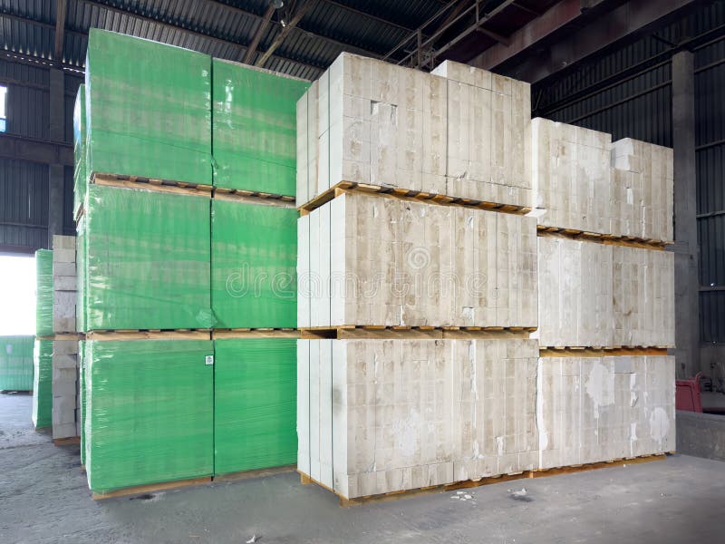 A Stack of Green and White Boards are Piled on Top of Each Other Stock ...