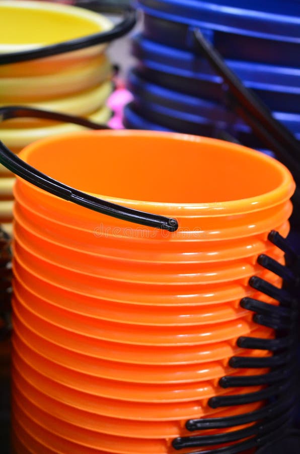 A Stack of Multi-colored Plastic Buckets. Stock Photo - Image of neat ...