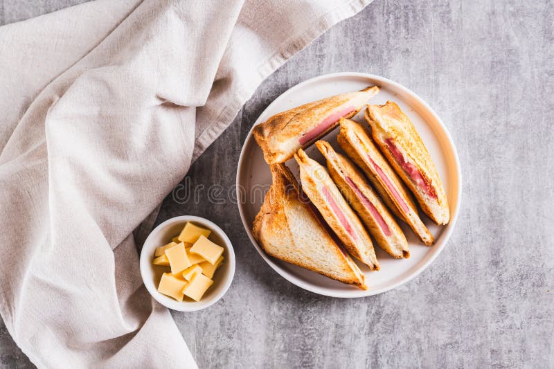 Stack of Grilled Cheese and Bacon Sandwiches on Plate on Table Top View ...