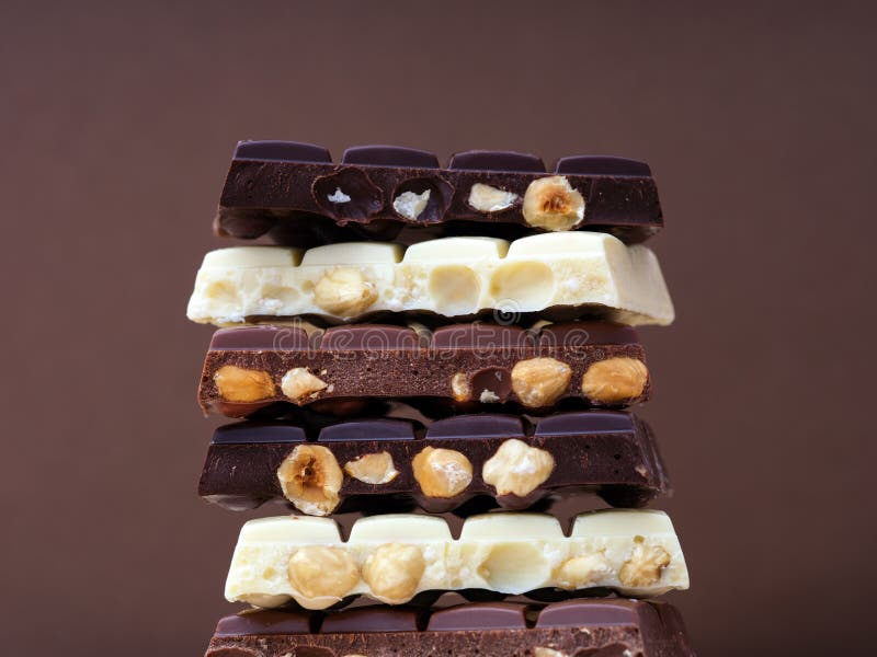 Stack of Half Chocolate Bars with Hazelnuts - Milk Chocolate, Dark ...