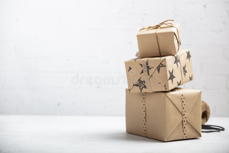 Stack of Handcraft Gift Boxes on White Brick Background Stock Image ...
