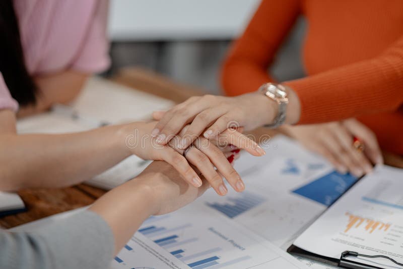 Stack of Hands Showing Unity and Teamwork, Close-up of Co-workers ...