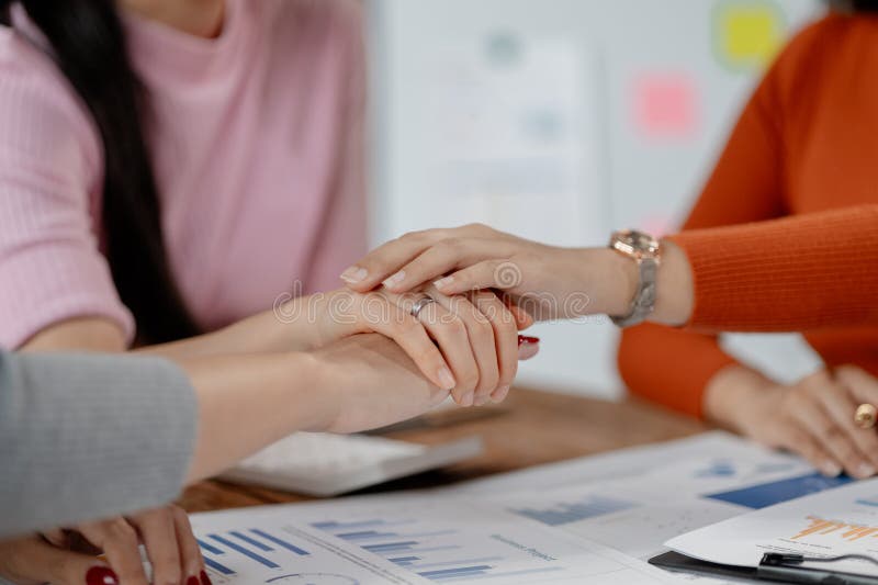 Stack of Hands Showing Unity and Teamwork, Close-up of Co-workers ...