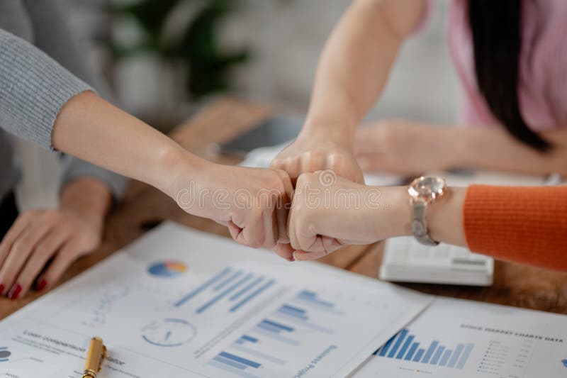 Stack of Hands Showing Unity and Teamwork, Close-up of Co-workers ...