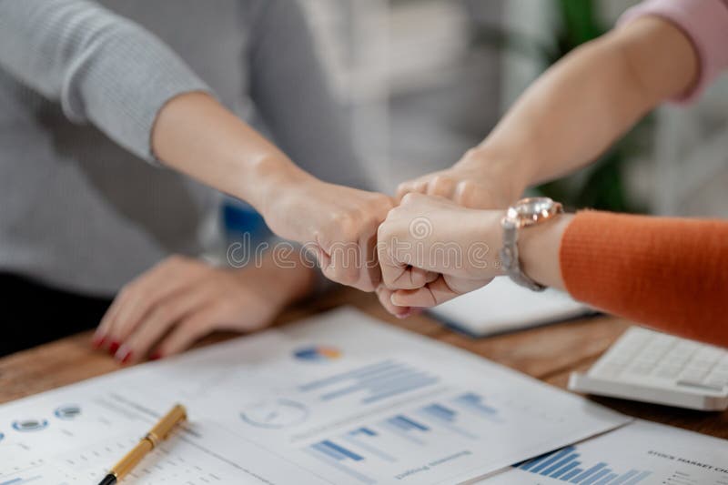 Stack of Hands Showing Unity and Teamwork, Close-up of Co-workers ...
