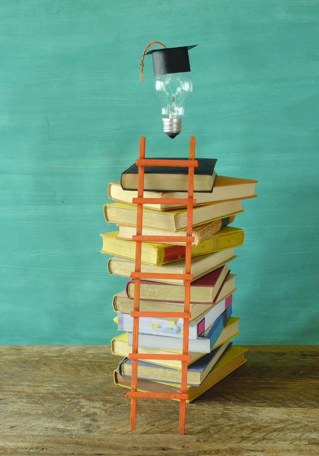Stack of Hardback Books with College Hat and Lightbulb. Learning ...