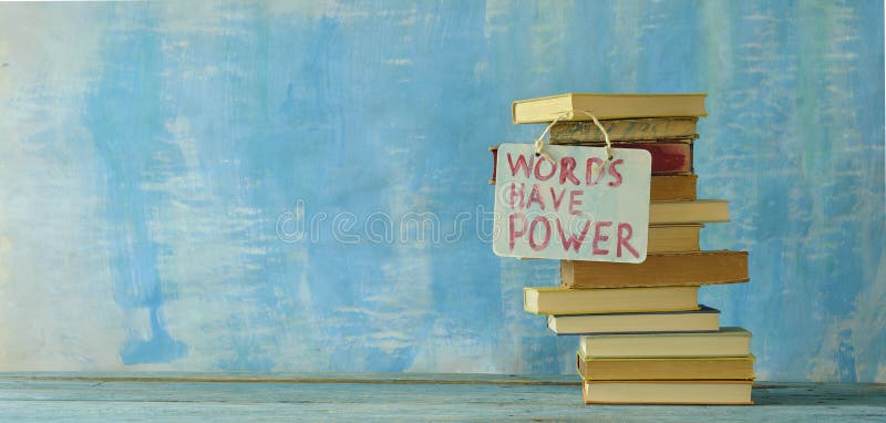 Stack of Hardback Books with Words Have Power Sign on Blue Background ...