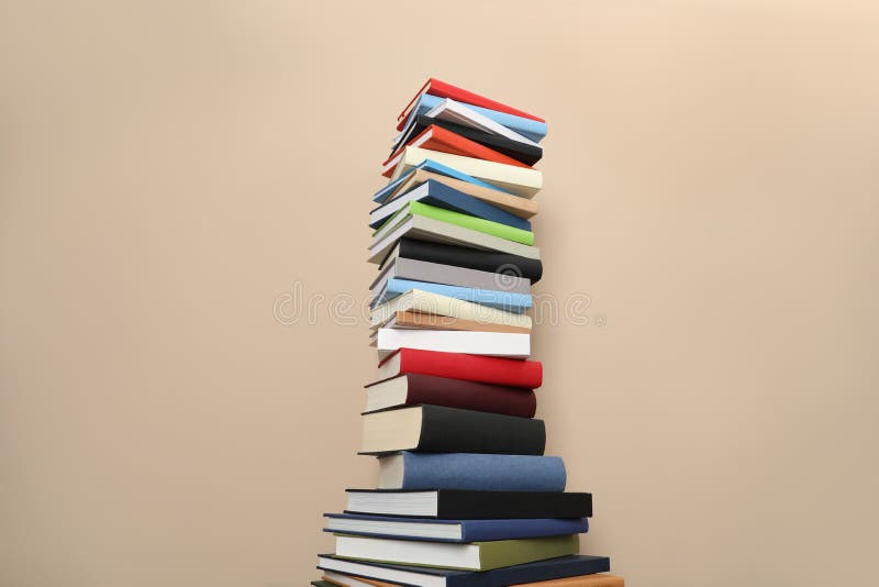 Stack of Hardcover Books on Beige Background Stock Image - Image of ...