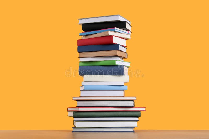 Stack of Hardcover Books on Orange Background Stock Image - Image of ...