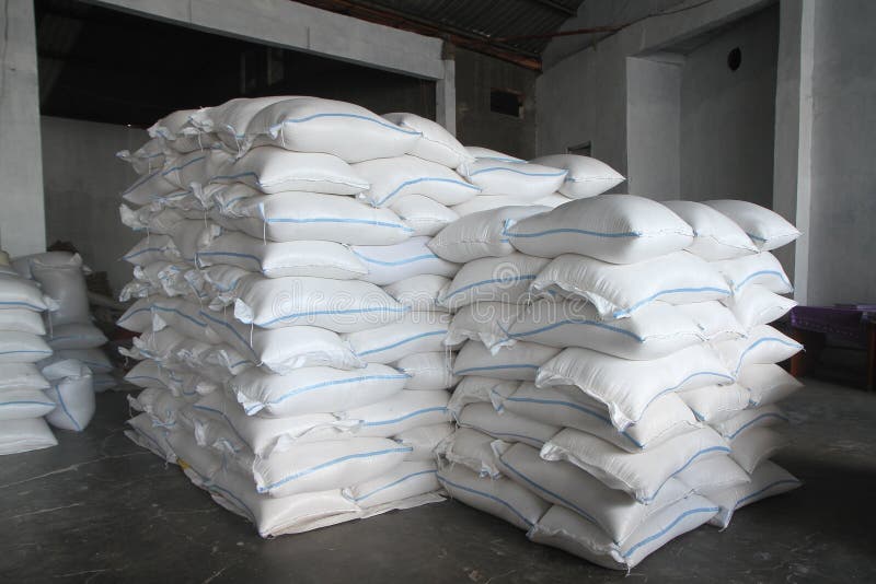 Stack hemp sacks of rice stock photo. Image of burlap - 263359874