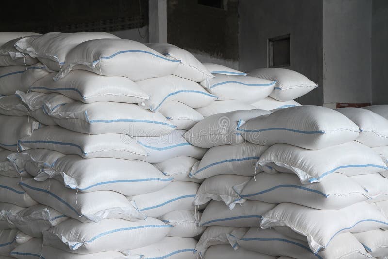 Stack hemp sacks of rice stock photo. Image of texture - 263359946