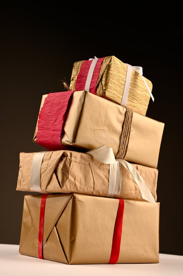 A Stack of Holiday Gifts, Side View Stock Image - Image of giving ...