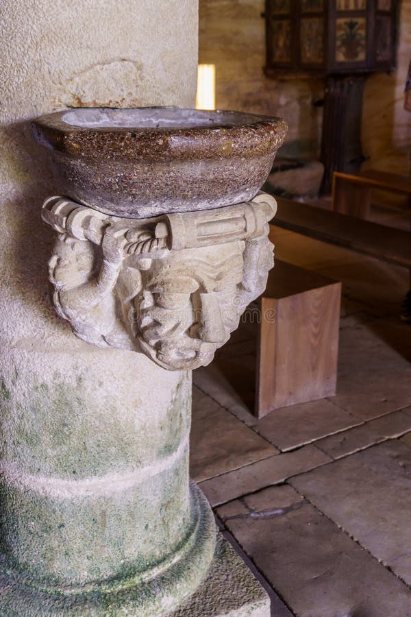 Stack of Holy Water Inside a Romanesque Catholic Church Stock Image ...